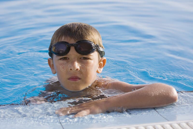 Boy on pool stock photo. Image of happy, exercise, play - 6482638