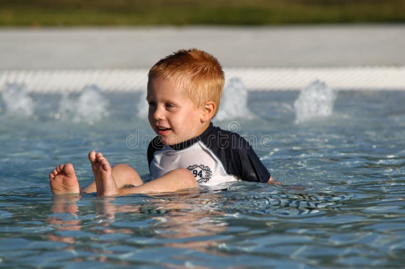 Boy in pool stock photo. Image of eyes, family, cool, pool - 6512852