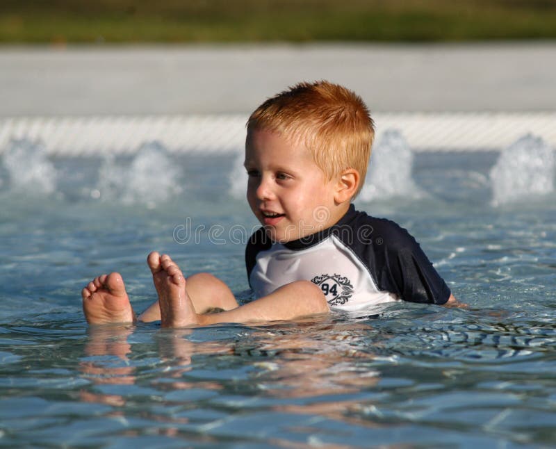 Young boy in pool stock photo. Image of healthy, vacation - 6021542
