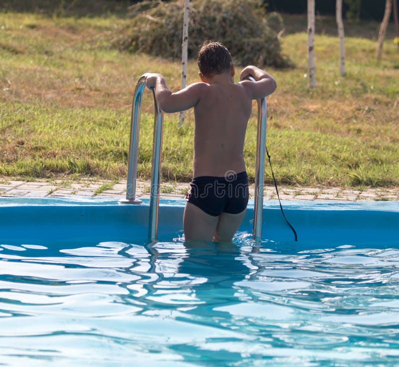 Boy in the Pool on the Stairs Stock Photo - Image of vacation, pool ...