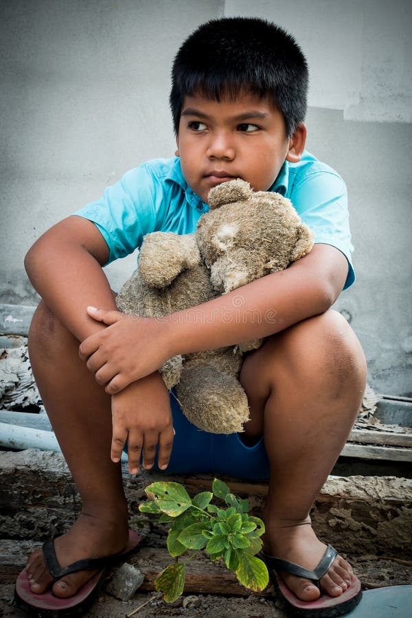 Boy Poor with Old Teddy Bear Stock Photo - Image of people, asian: 73246456