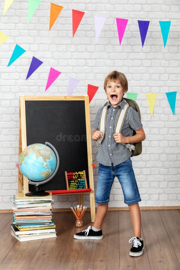 Boy Posing for the First Day at School Stock Photo - Image of ...