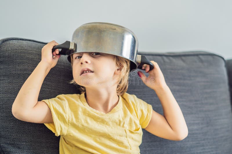 A Boy with a Pot on His Head. Childhood, Cook Stock Image - Image of ...