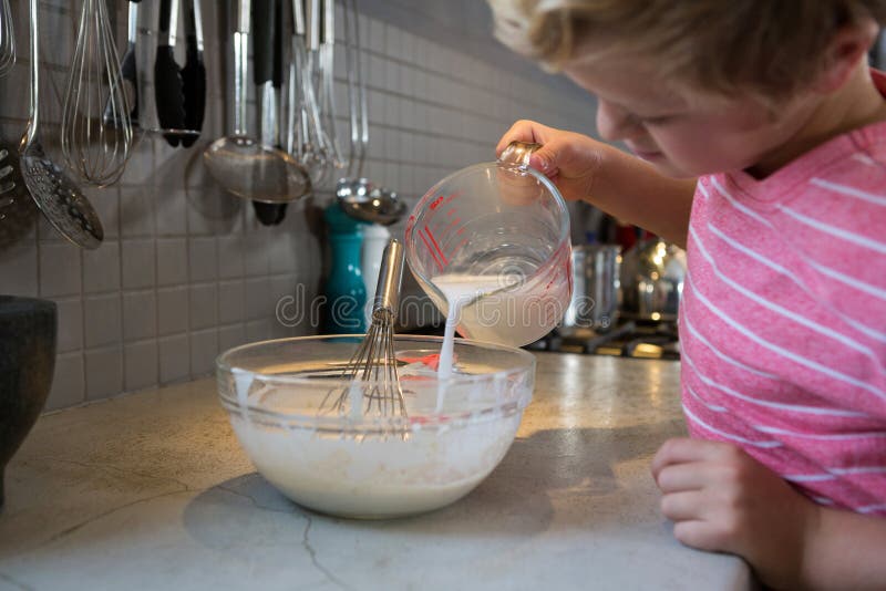 Boy Pouring Milk Batter Stock Photos - Free & Royalty-Free Stock Photos ...