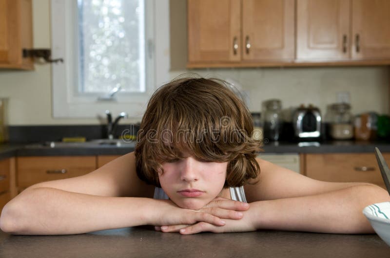 Boy pouting stock photo. Image of breakfast, alone, preteen - 13273666