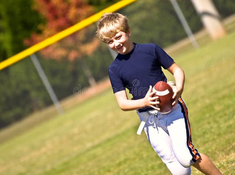Boy Practicing Football stock image. Image of game, childhood - 11215127
