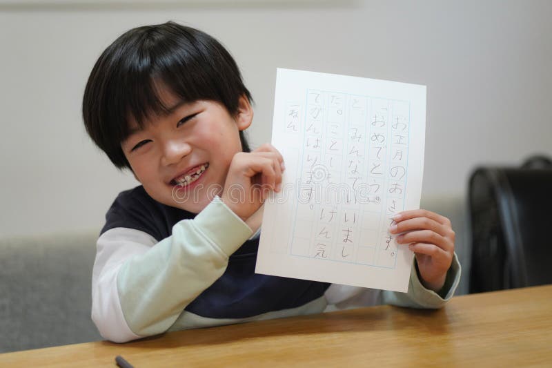 A Boy Practicing Hard Penmanship Stock Image - Image of vacation ...