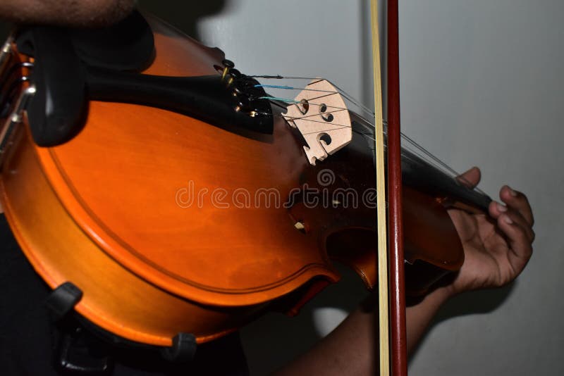 A Boy Practicing Violin for Fun Stock Photo - Image of play, practice ...