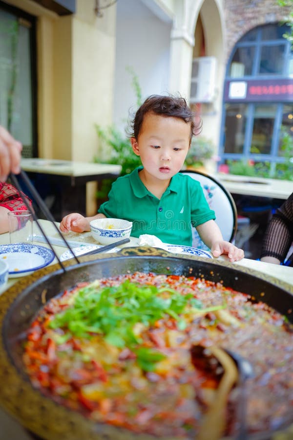 Boy prepare to have lunch stock photo. Image of hotpot - 146473610