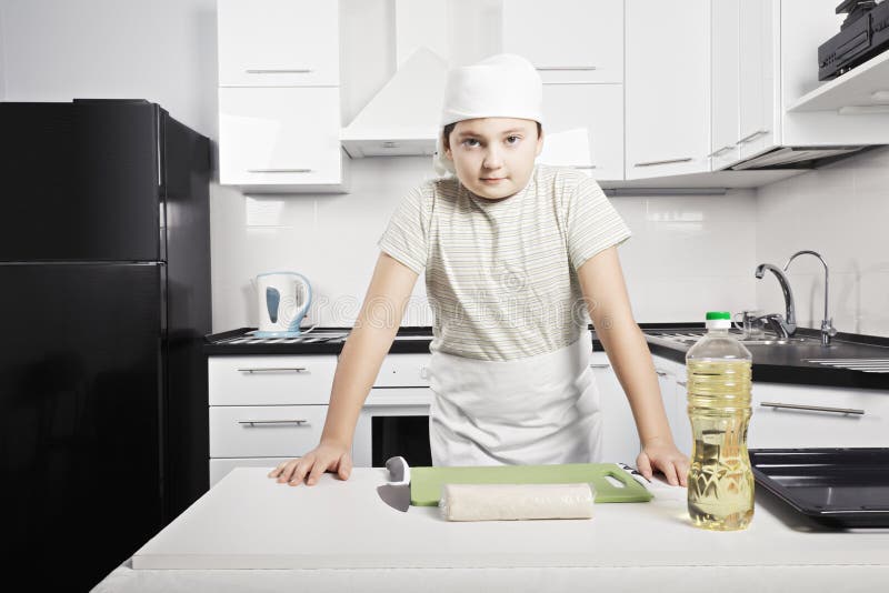Boy prepared to cook stock photo. Image of cook, leisure - 63451606