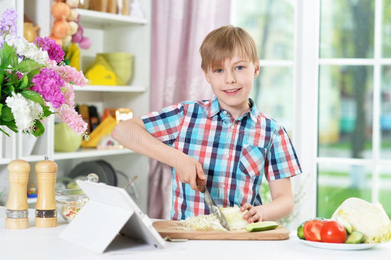 Cute Boy Eating Healthy Salad at Kitchen Stock Image - Image of healthy ...
