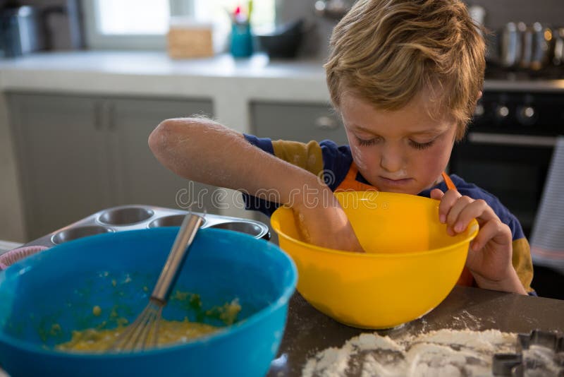 Boy Preparing Food in Yellow Bowl Stock Photo - Image of drink ...