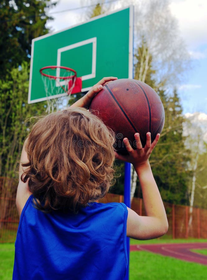 Boy Preparing To Throw the Ball Stock Image - Image of court, player ...