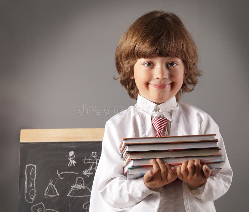Boy Primary School Students with Books Stock Image - Image of ...