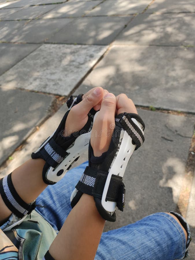 Boy in Protective Gear Rollerblading in the Park Stock Image - Image of ...