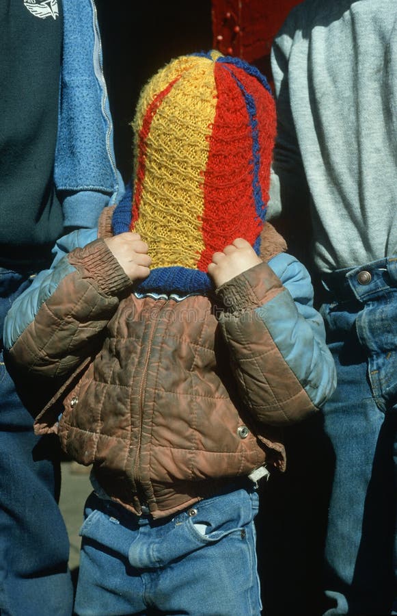 Boy Pulling Wool Cap Over His Head Editorial Stock Image - Image of ...