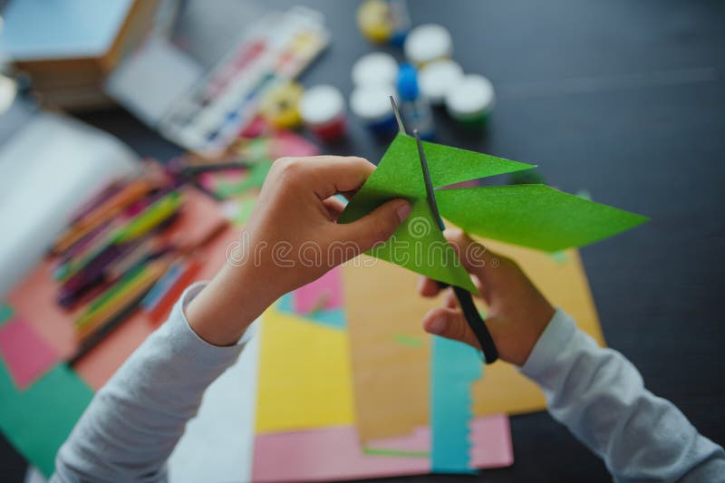 Boy Pupil Doing Paper Cut Lesson at Home Stock Image - Image of table ...