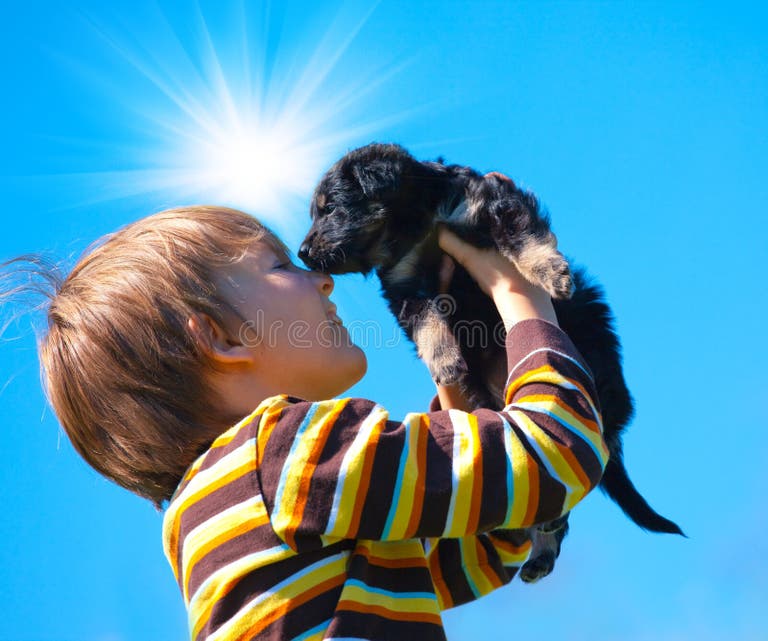 734 Little Boy Holding Puppy Stock Photos - Free & Royalty-Free Stock ...