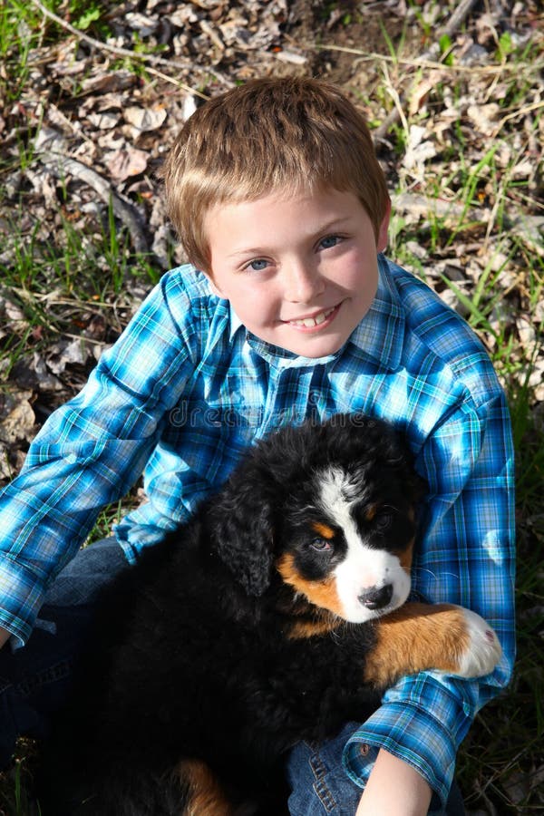 Boy and Puppy stock image. Image of outside, canine, domestic - 42658185