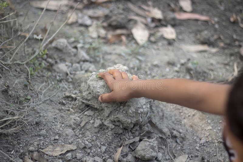 A Boy Puts His Right Hand on the Ground Stock Image - Image of skin ...