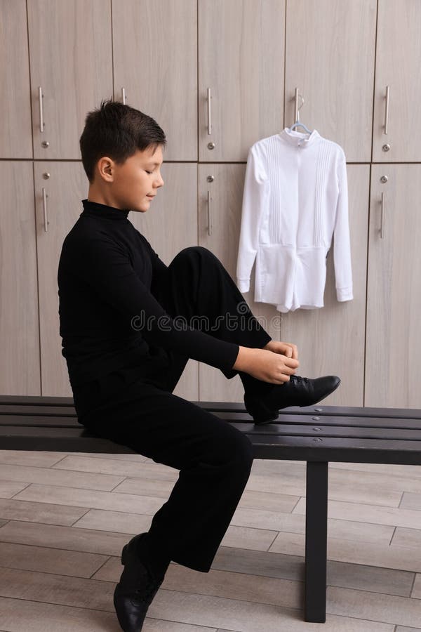 Little Boy Putting on Shoes in Locker Room Stock Photo - Image of ...