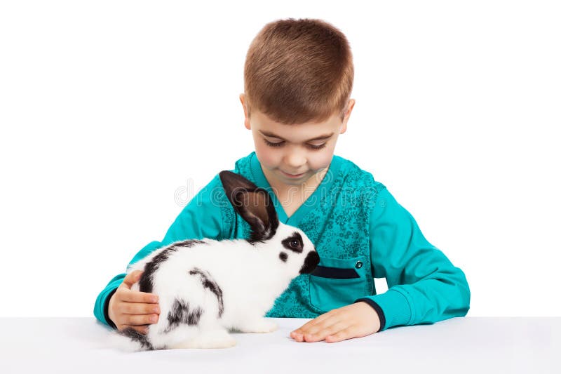 Boy with rabbit stock photo. Image of childhood, fruit - 81327206