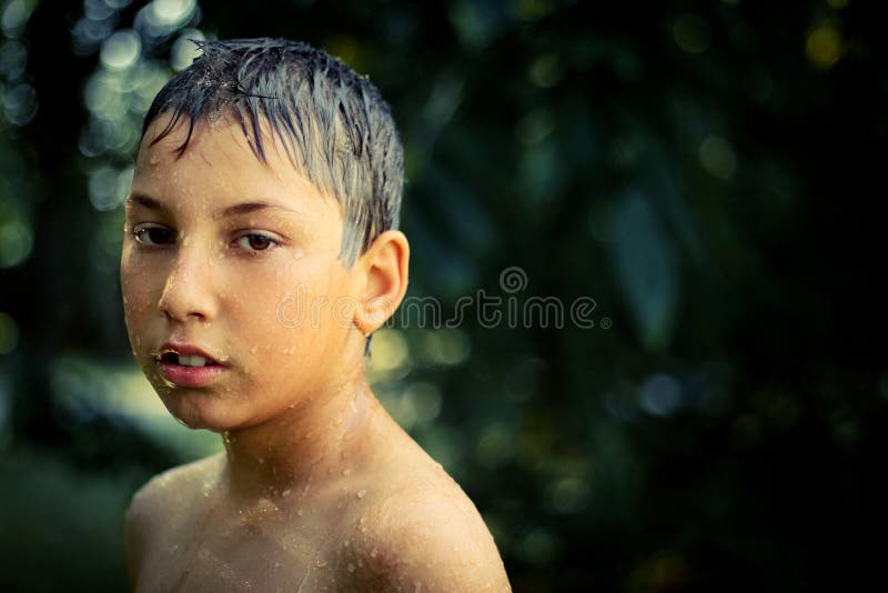 Boy after rain stock image. Image of splash, white, beauty - 67101147