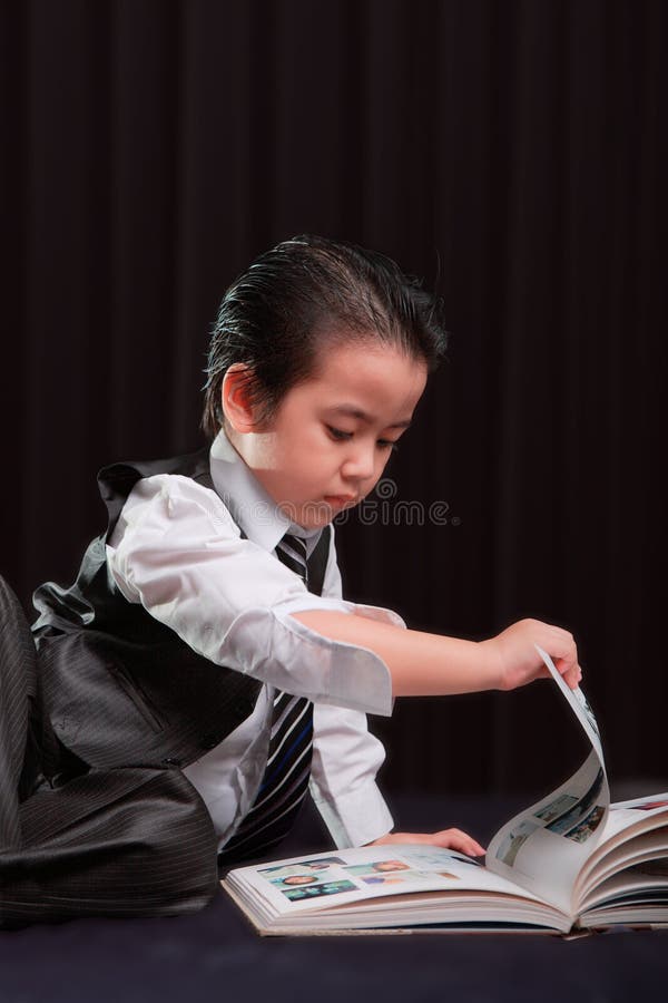 The boy read a book stock photo. Image of book, blond - 58575710