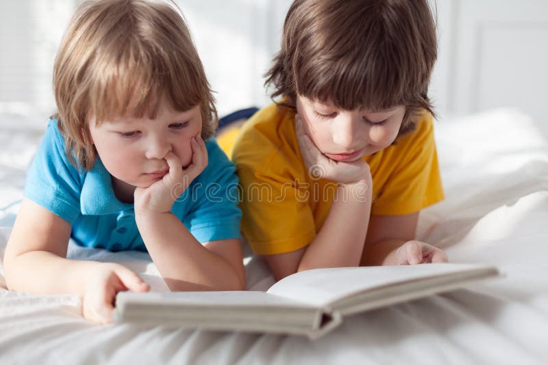 Boy read book indoors stock image. Image of activity - 88513289