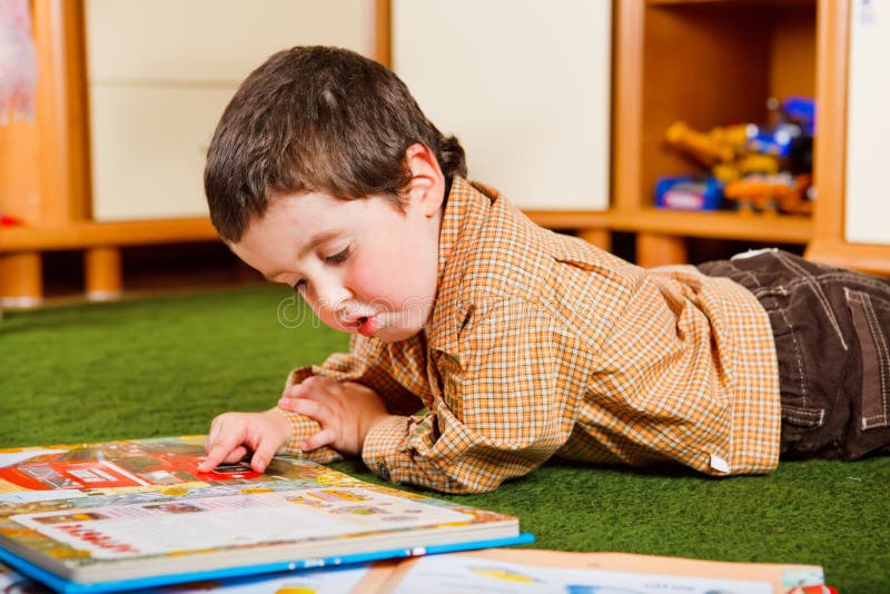 Boy reading stock image. Image of child, elementary, education - 11571275