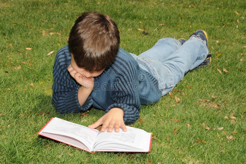 Boy is reading a book stock image. Image of book, resting - 2888459