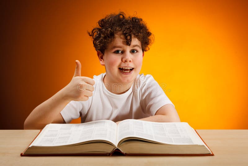 Boy reading book stock photo. Image of learning, boys - 19350590
