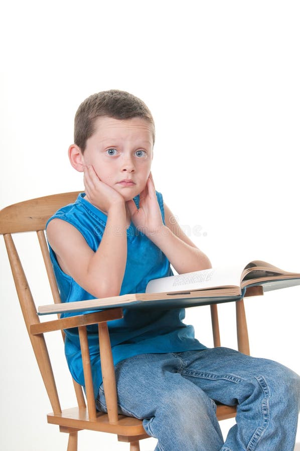 Boy reading book stock image. Image of childhood, serious - 22865425