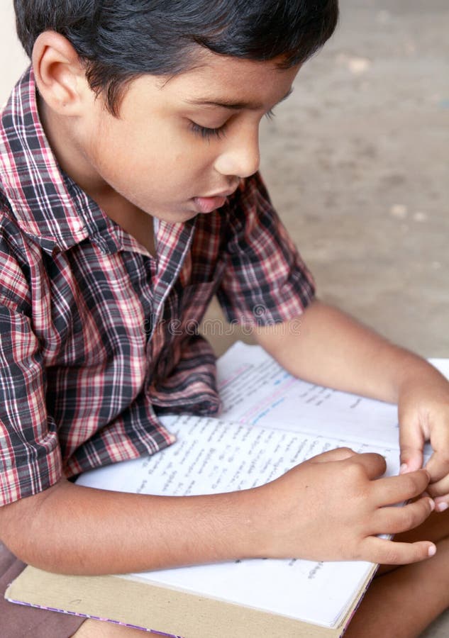 Boy Reading the Book stock photo. Image of looking, study - 24572146