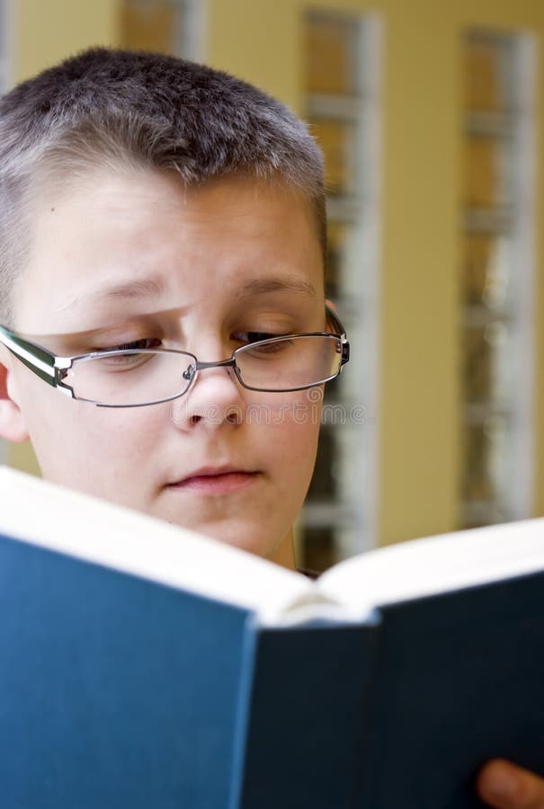 Boy reading a book stock photo. Image of book, page, child - 1864170