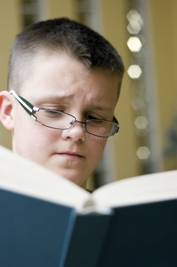 Boy reading book stock image. Image of reads, read, white - 4712495
