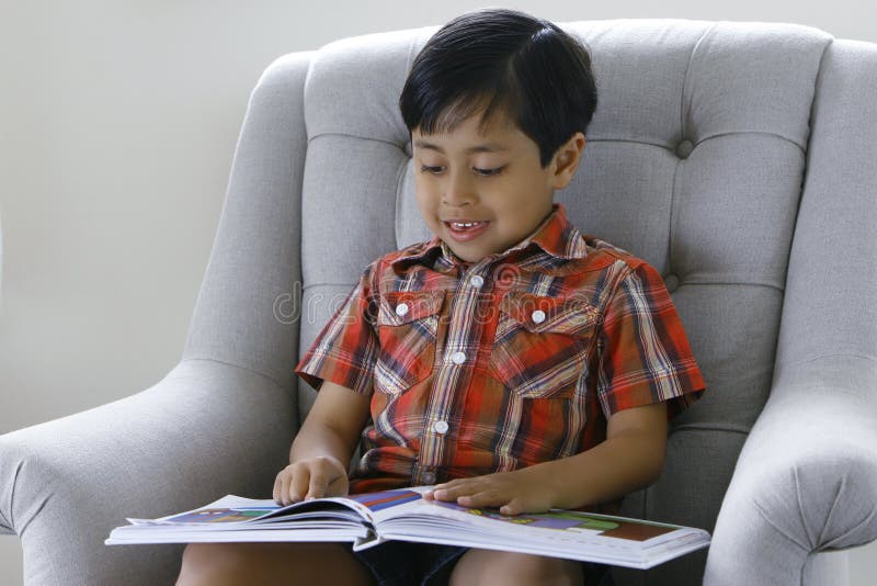 Boy reading a book stock photo. Image of reading, read - 9824538