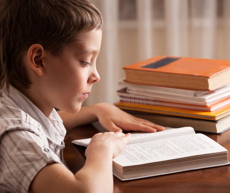 Boy reading book stock photo. Image of studying, school - 194960788