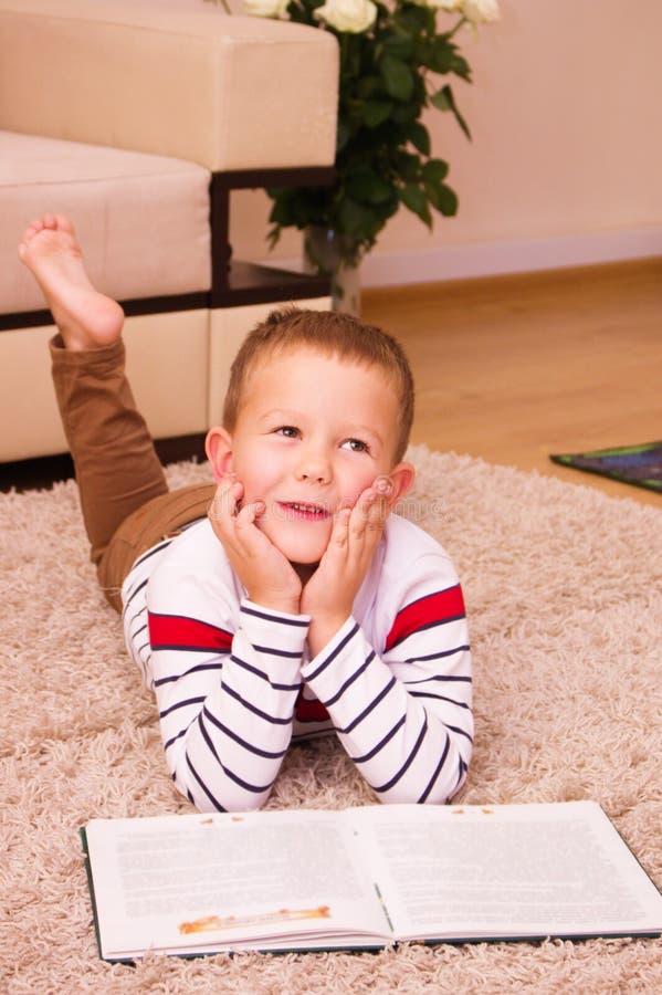Boy is reading a book stock image. Image of smiling, portrait - 46284653