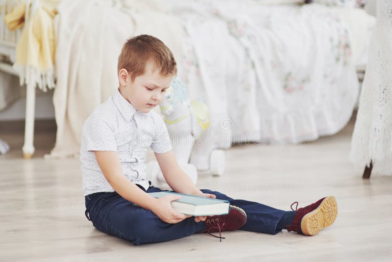 Boy Reading a Book. Getting Ready for School Stock Image - Image of ...