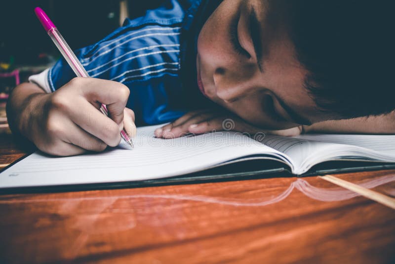 The Boy is Reading the Book for Prepare the Exam on this Coming Monday ...