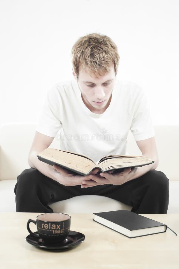 Boy Reading a Book and Relaxing Stock Photo - Image of casual, male ...