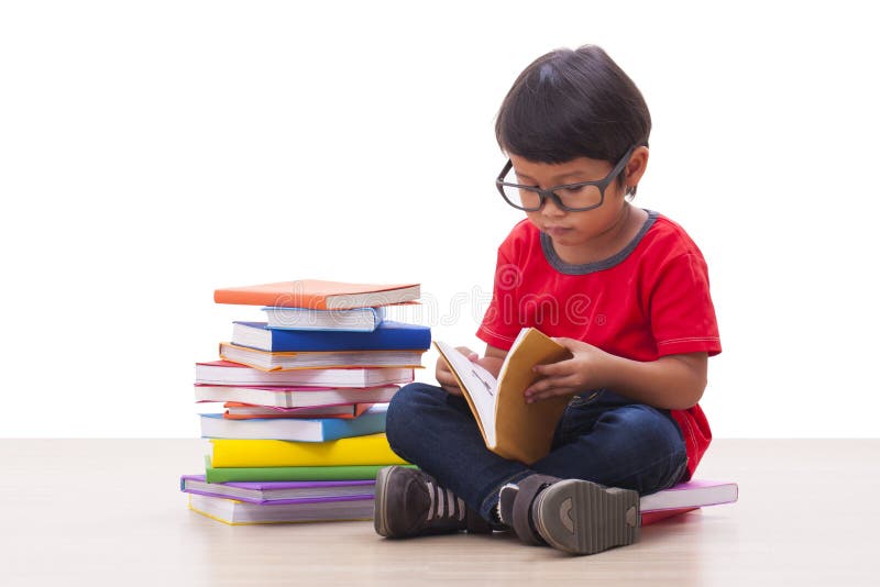 Cute boy reading a book stock photo. Image of isolated - 41463824