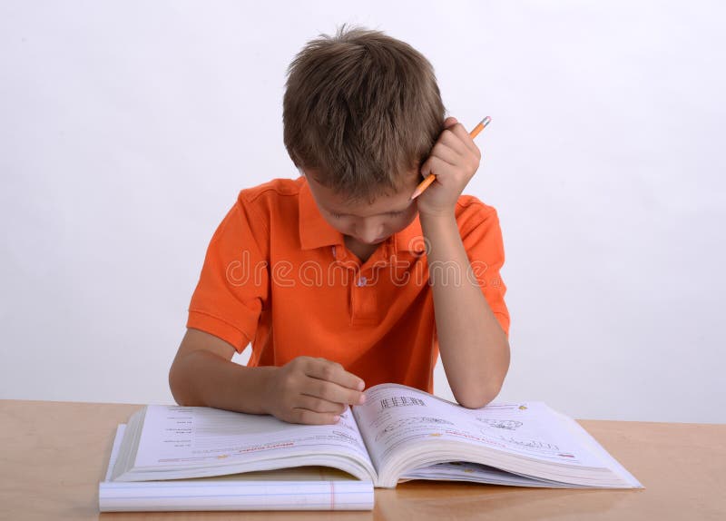 Boy reading homework stock photo. Image of ideas, cheerful - 42256348