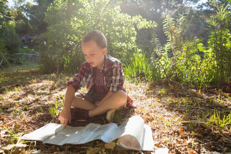 Boy Reading the Map in the Forest Stock Image - Image of hiker ...