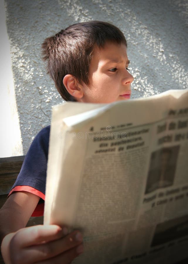 Boy Reading the News stock photo. Image of caucasian - 11958426