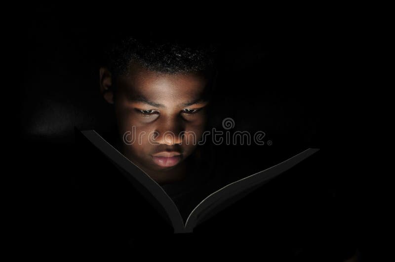 Boy reading at night stock photo. Image of looking, reading - 31494224