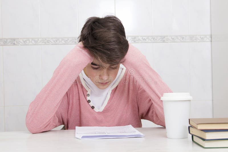 Boy reading on table stock photo. Image of studying - 134326754