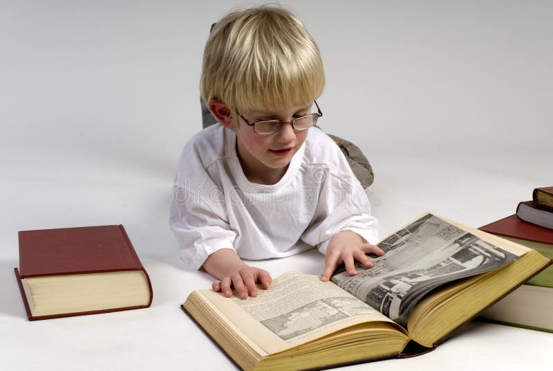 Boy is reading thick books stock image. Image of professor - 2016625