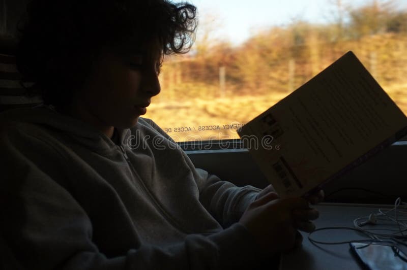 Teen Boy Reading Train Stock Photos - Free & Royalty-Free Stock Photos ...